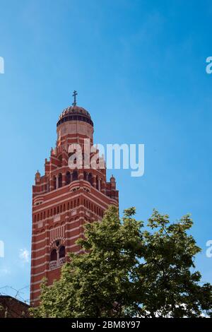 Westminster Cathedral clock tower from street level between modern ...