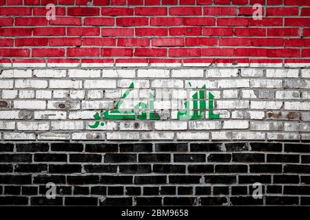 National flag of Egypt depicting in paint colors on an old brick wall ...