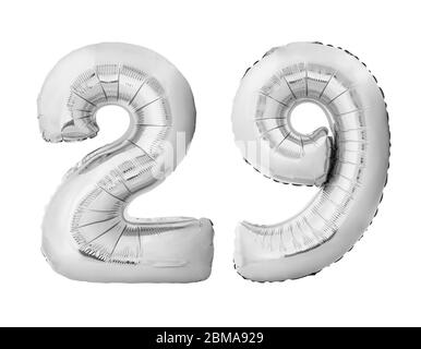 Number 29 twenty nine made of golden inflatable balloons isolated on ...
