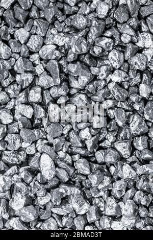 Heap of silver nuggets (close up shot) for use as background or texture ...