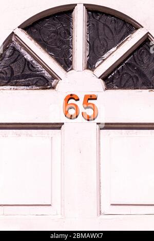 House numbr 65 Stock Photo - Alamy