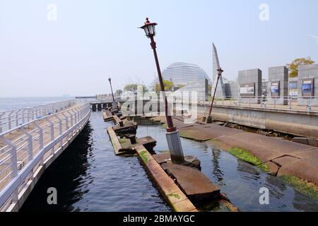 Ruined Meriken Wharf in Kobe, Japan. It was damaged by the Great ...