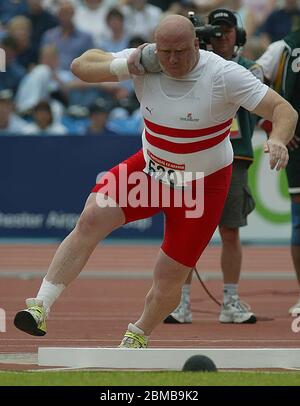 MANCHESTER - JULY 30: Mark Proctor of England compete in the Men's Shot ...