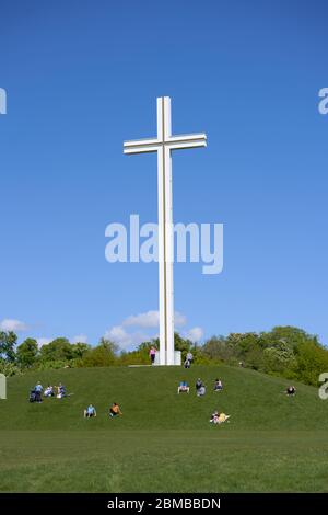 Papal cross in the phoenix park eerily framed by twisted tree branches ...
