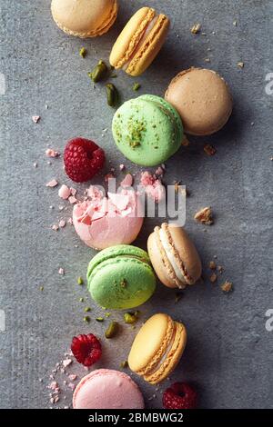 Colorful macarons on gray marble background. Top view. Pastel colors ...