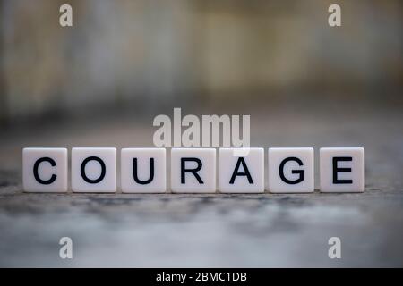 Courage in block letters Stock Photo - Alamy