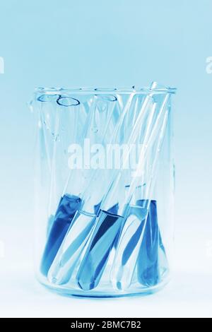 Solution chemistry. Test tubes with different samples on table, above ...