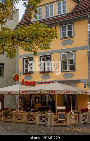 City Riga, Latvia. Street Restaurant food festival. Peoples walking and ...