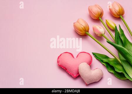 Valentine's Day concept with rosy felt heart and crochet fir trees ...