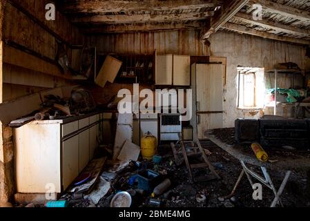 old kitchen destroyed, interior abandoned house Stock Photo - Alamy