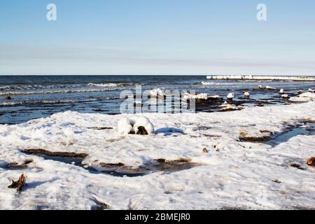 frozen beach in cold winters day with colorful sky and ice Stock Photo ...