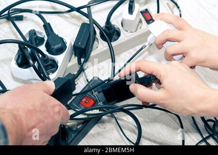Lots of electrical outlets-enabled devices. Power saving Stock Photo ...