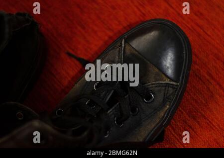 Ragged Black Stylish Shoes, Vintage Black Stylish Shoes Stock Photo - Alamy