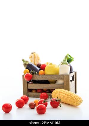Wooden crate with fresh vegetables isolated on white Stock Photo - Alamy