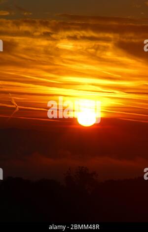 Sunrise looking towards Beeston headland from Borras Head, Wrexham ...