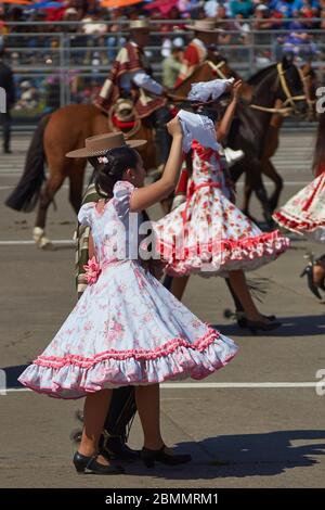 Traditional cueca dance group performing at the annual Military parade ...