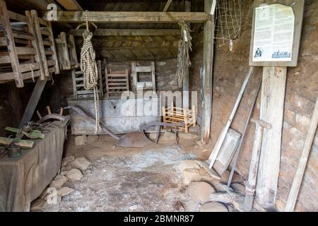View inside a storeroom, one of the main farm house buildings ...
