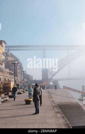 An old bridge of Porto in the mist - historical property of the ...