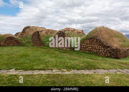 Detail showing the layers of turf at the back of farm buildings ...