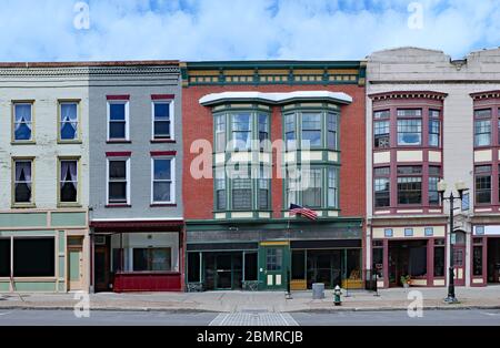 Old fashioned small town main street buildings, with stores on ground ...