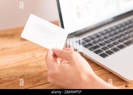 Top view of man using credit card for online shoping Stock Photo - Alamy