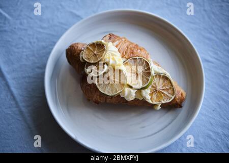 croissant with creame patisserie and lemon Stock Photo - Alamy