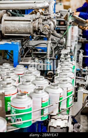 The interior of a glue and adhesives assembly line in a factory in ...