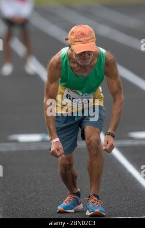 Man Competing In Race At Stadium; London, England, Uk Stock Photo - Alamy