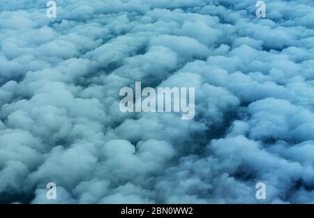 White clouds taken form above while flying in a plane Stock Photo - Alamy