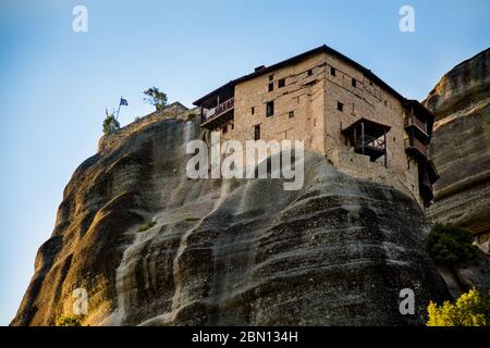 Holy Monastery of Saint Nicholas Anapafsas on a rock cliff at Meteora ...