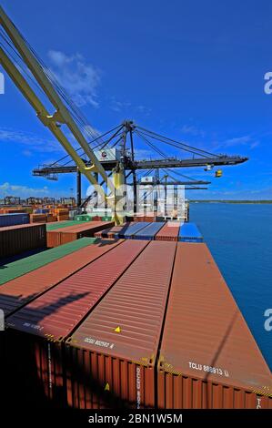 caucedo port, dominican republic - 2013.10.16: containerships loading ...