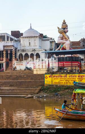 Chitrakoot, Madhya Pradesh, India : A boatman rows past a palace at ...