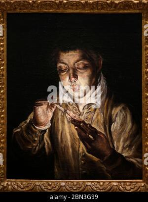 A boy blowing on an ember to light a candle c.1570; Venice, Italy by El ...