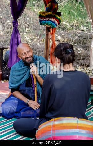 Zen master giving a dokusan (private talk with a disciple) during a ...