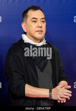 Hong Kong actor Anthony Wong, right, speaks after winning "Best Actor ...