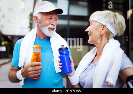 jogging friends couple congratulate and happy to finish their morning ...