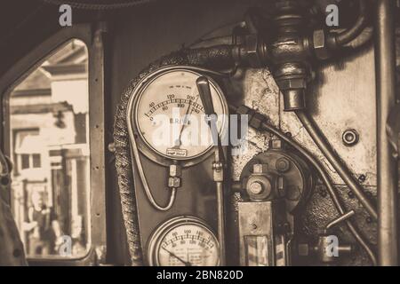 Gauges in the cab steam locomotive Stock Photo - Alamy