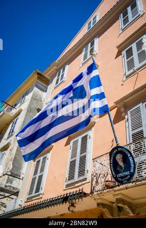 Greek flag flying from a balcony in Old Town Corfu, Greece Stock Photo ...