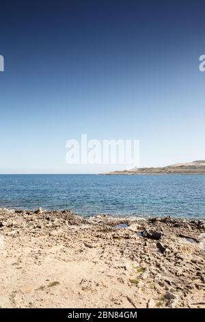 seascape image from Qawra beach looking across the sea to Maghtab in ...