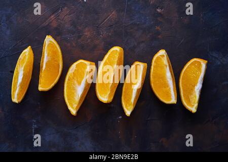 Fruit, Seven orange slices on a white background Stock Photo - Alamy