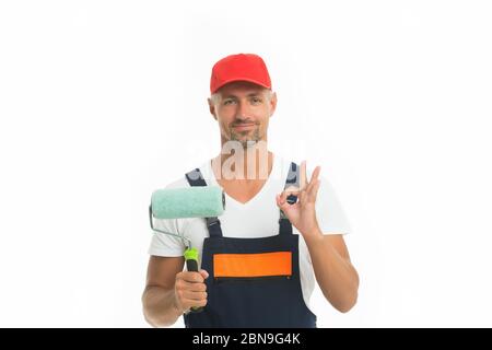 Able to work quickly and accurately. Painter decorator show ok sign ...