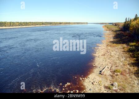 The Moose River which flows north into James Bay, near the indigenous ...