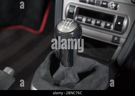 Gear shift and control buttons of a black car Stock Photo - Alamy