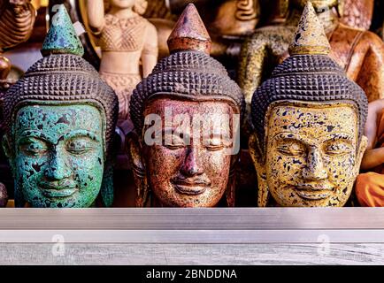 Beautiful shot of heads of multiple colorful Buddhist statues Stock ...