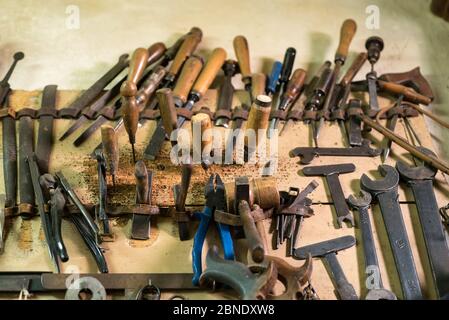 Old craftsman used a lot of his tools in his workshop Stock Photo - Alamy