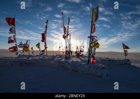 international flags planted on the salt flats of Uyuni in Bolivia Stock ...