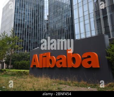 The LOGO of the Alibaba office building is seen in downtown Huangpu ...