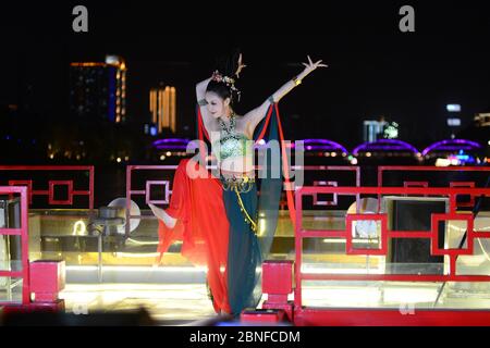 A performer plays Dunhuang Flying Apsaras Dance, which drew inspiration ...