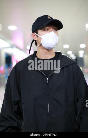 Chinese actor Wei Daxun shows up at a Shanghai airport after landing in ...