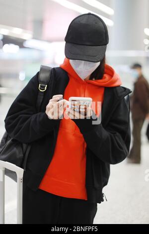 Chinese actress Liu Mintao shows up at a Shanghai airport after landing ...